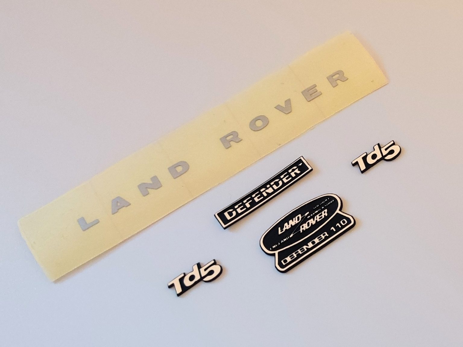 1:10 Scale Land Rover Defender D110 Emblem Set - Scale Custom